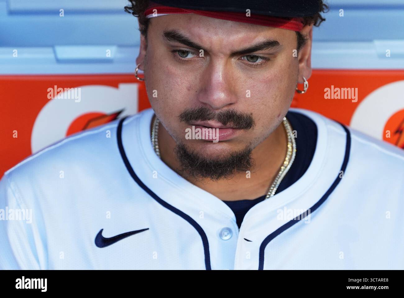Seattle Mariners first baseman Josh Naylor sits in the dugout before ...