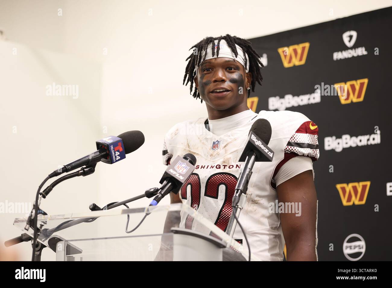 Washington Commanders running back Jacory Croskey-Merritt (22) answers ...