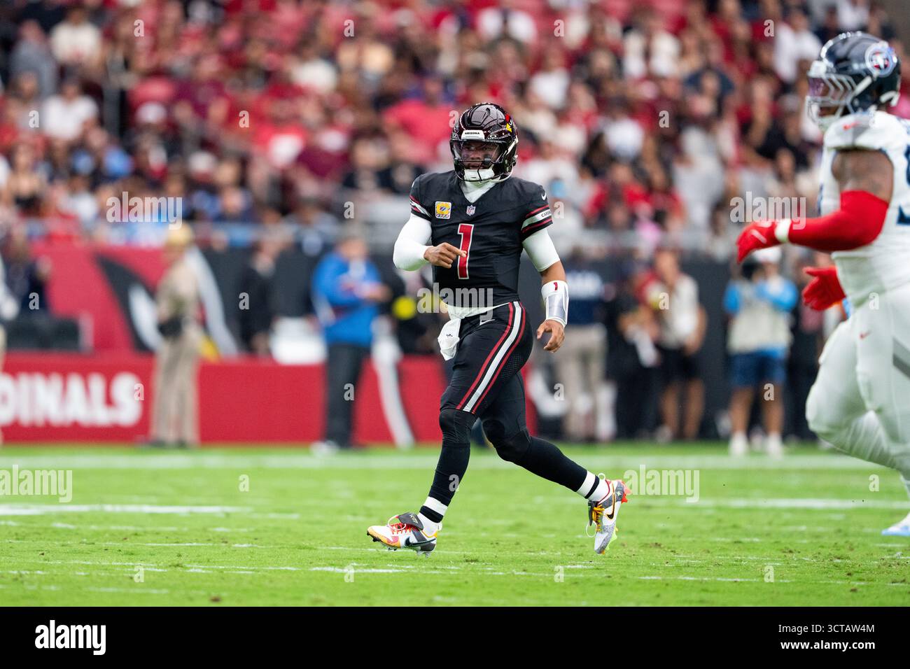 Arizona Cardinals quarterback Kyler Murray (1) runs in an NFL football ...