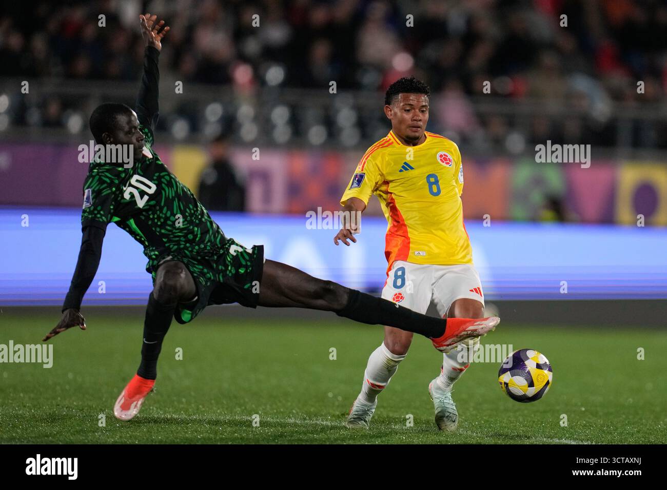Nigeria's Haruna Aliyu, left, and Colombia's Royner Benitez vie for the ball during a FIFA U-20 ...