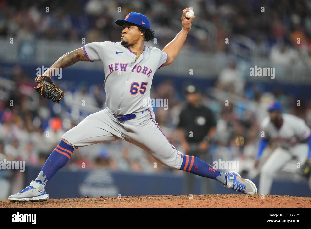 New York Mets relief pitcher Gregory Soto (65) throws during the eighth inning of a baseball ...
