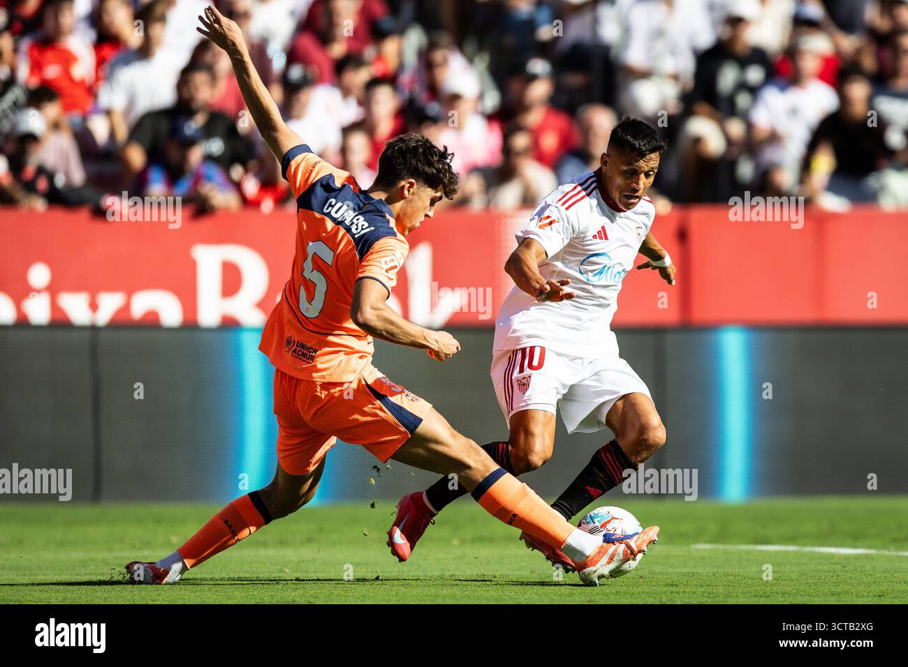 Pau CUBARSI of Barcelona and Alexis SANCHEZ of Sevilla FC during the ...