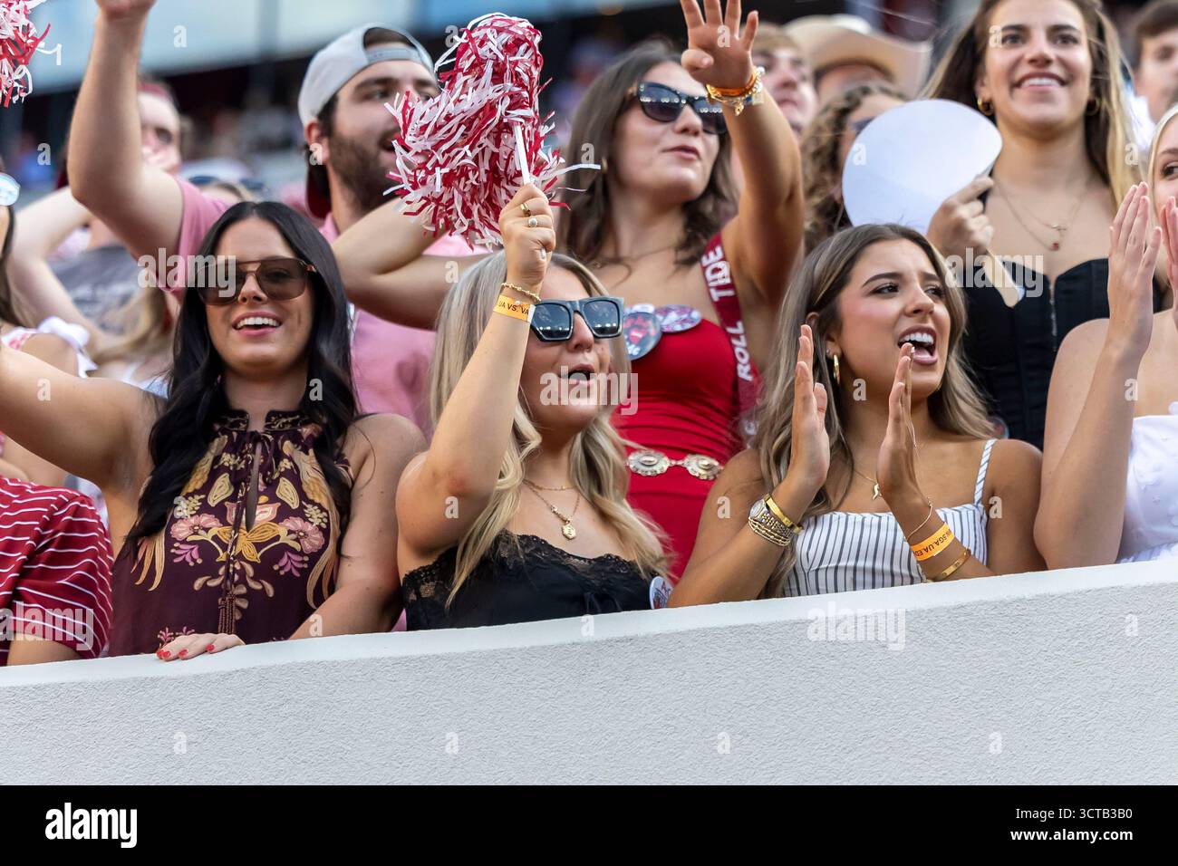 Alabama fans cheer during the second half of an NCAA college football ...