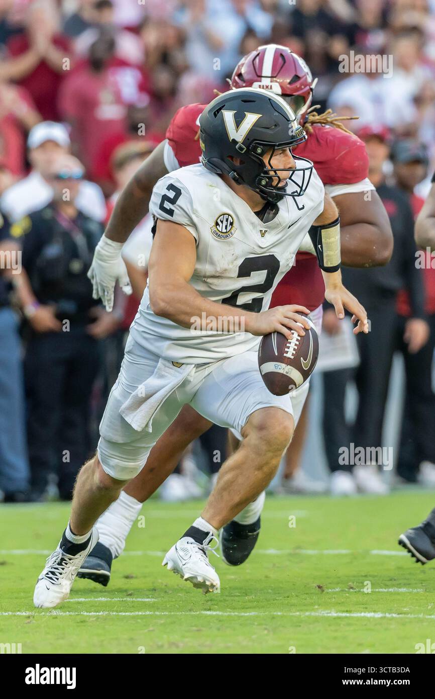 Vanderbilt quarterback Diego Pavia (2) maneuvers behind his linemen ...
