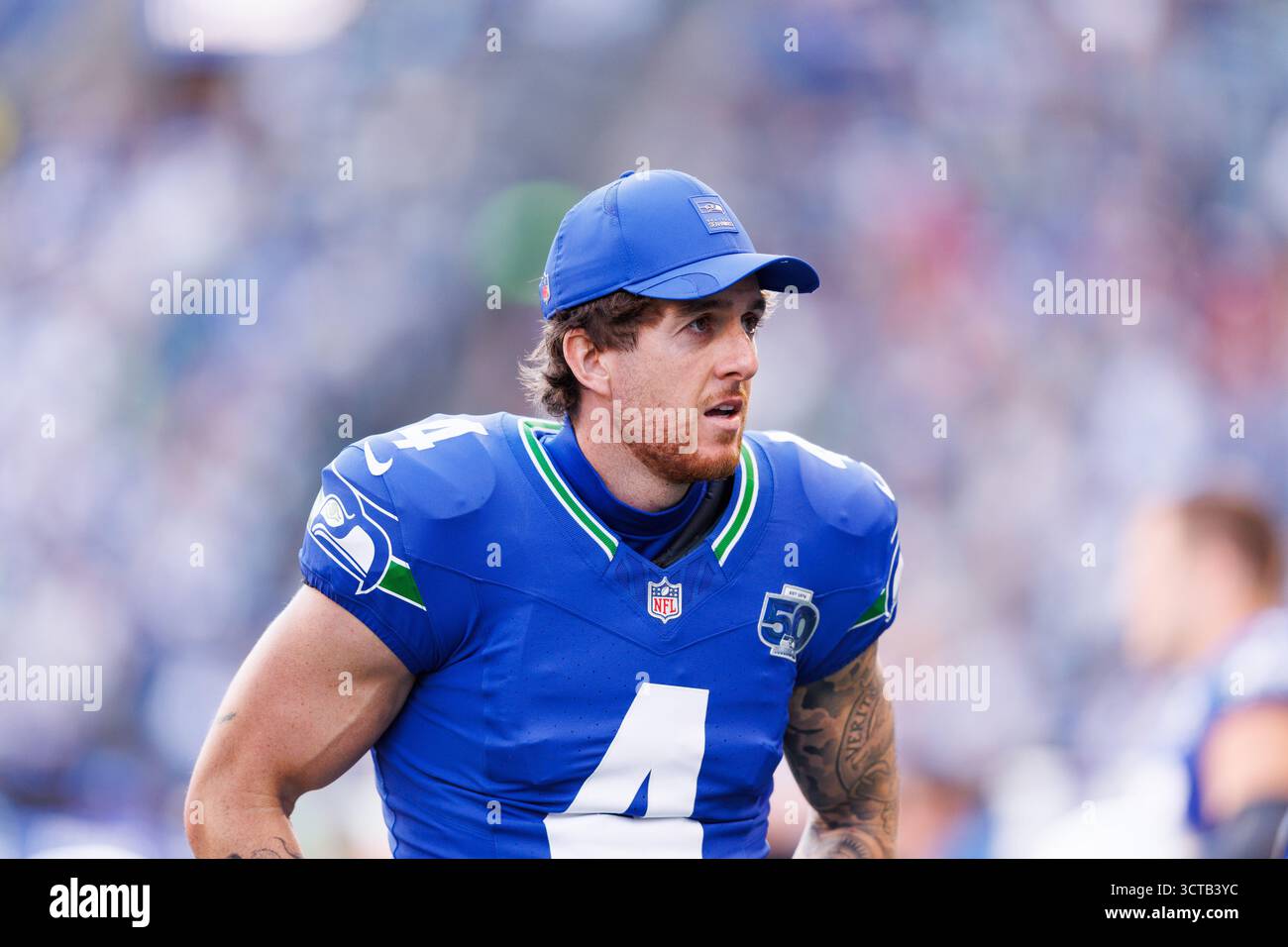 Seattle Seahawks punter Michael Dickson (4) looks on from the sidelines ...
