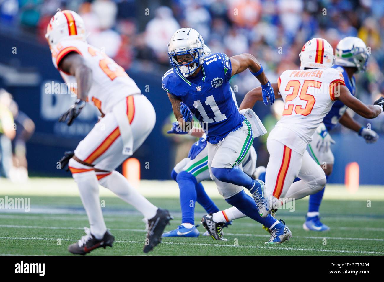 Seattle Seahawks wide receiver Jaxon Smith-Njigba (11) runs a play during an NFL football game ...