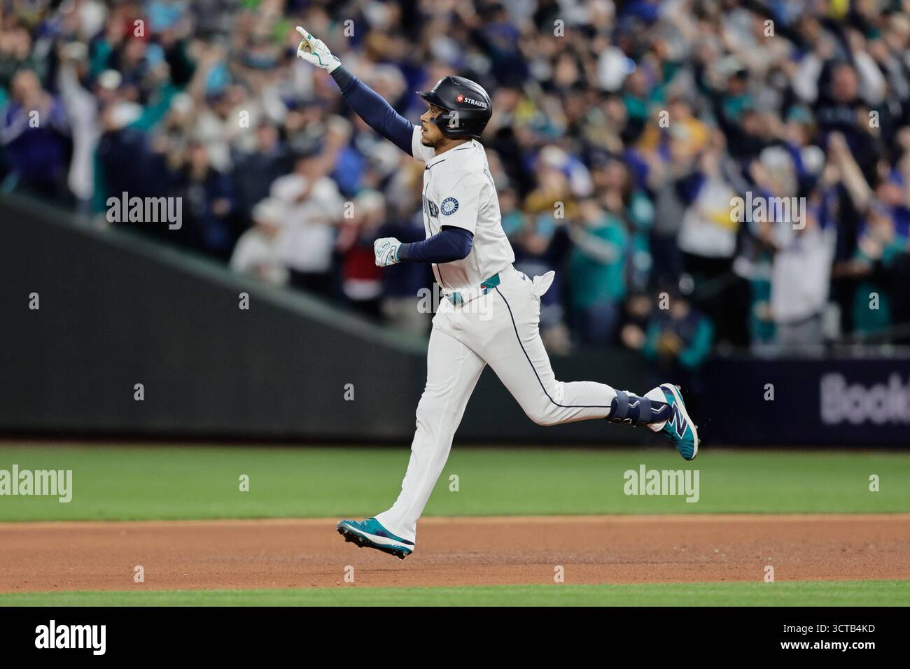 Seattle Mariners' Jorge Polanco runs the bases after hitting a solo ...