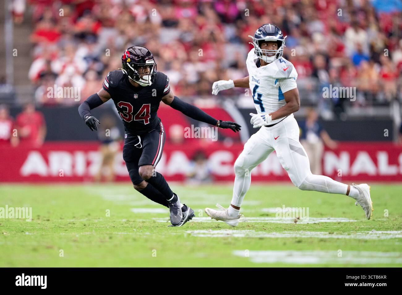 Arizona Cardinals safety Jalen Thompson (34) and Tennessee Titans wide ...