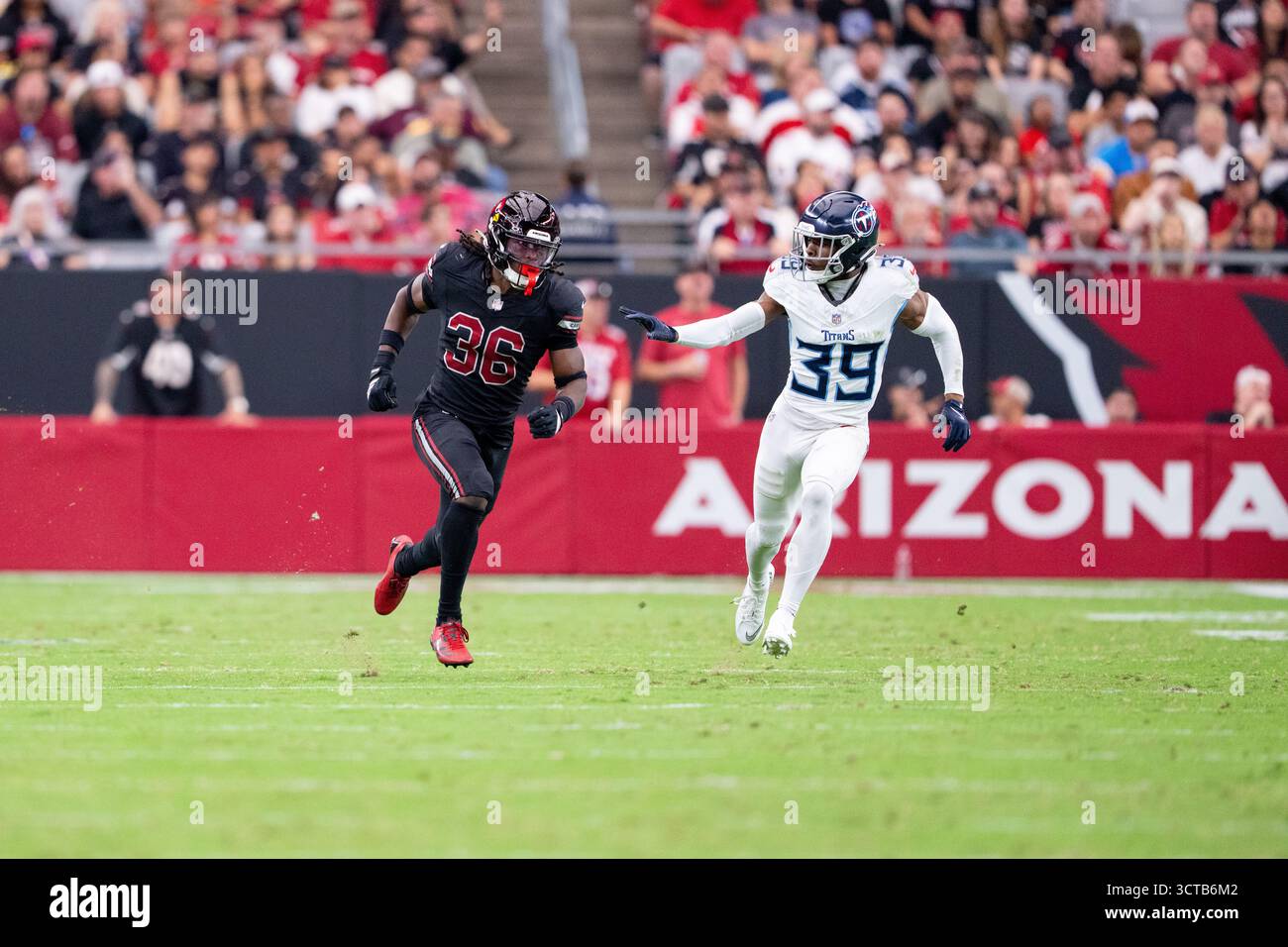 Arizona Cardinals safety Kitan Crawford (36) and Tennessee Titans ...
