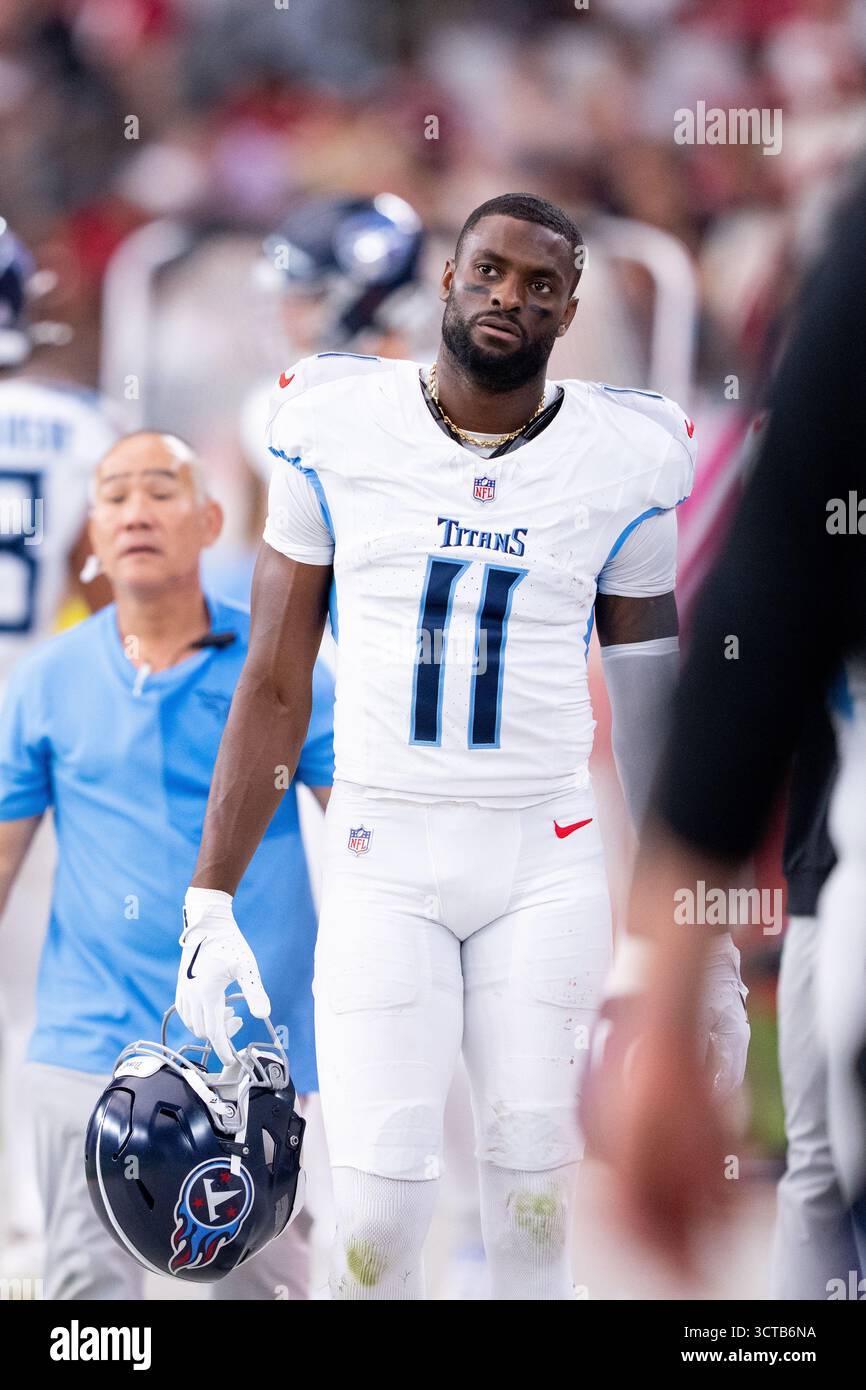 Tennessee Titans wide receiver Van Jefferson (11) walks with his helmet ...