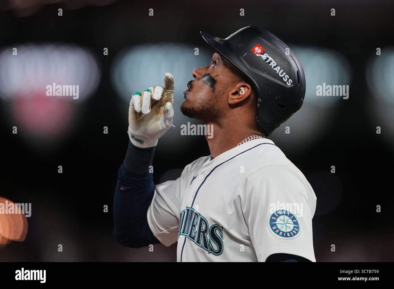 Seattle Mariners' Jorge Polanco reacts after hitting a single during ...