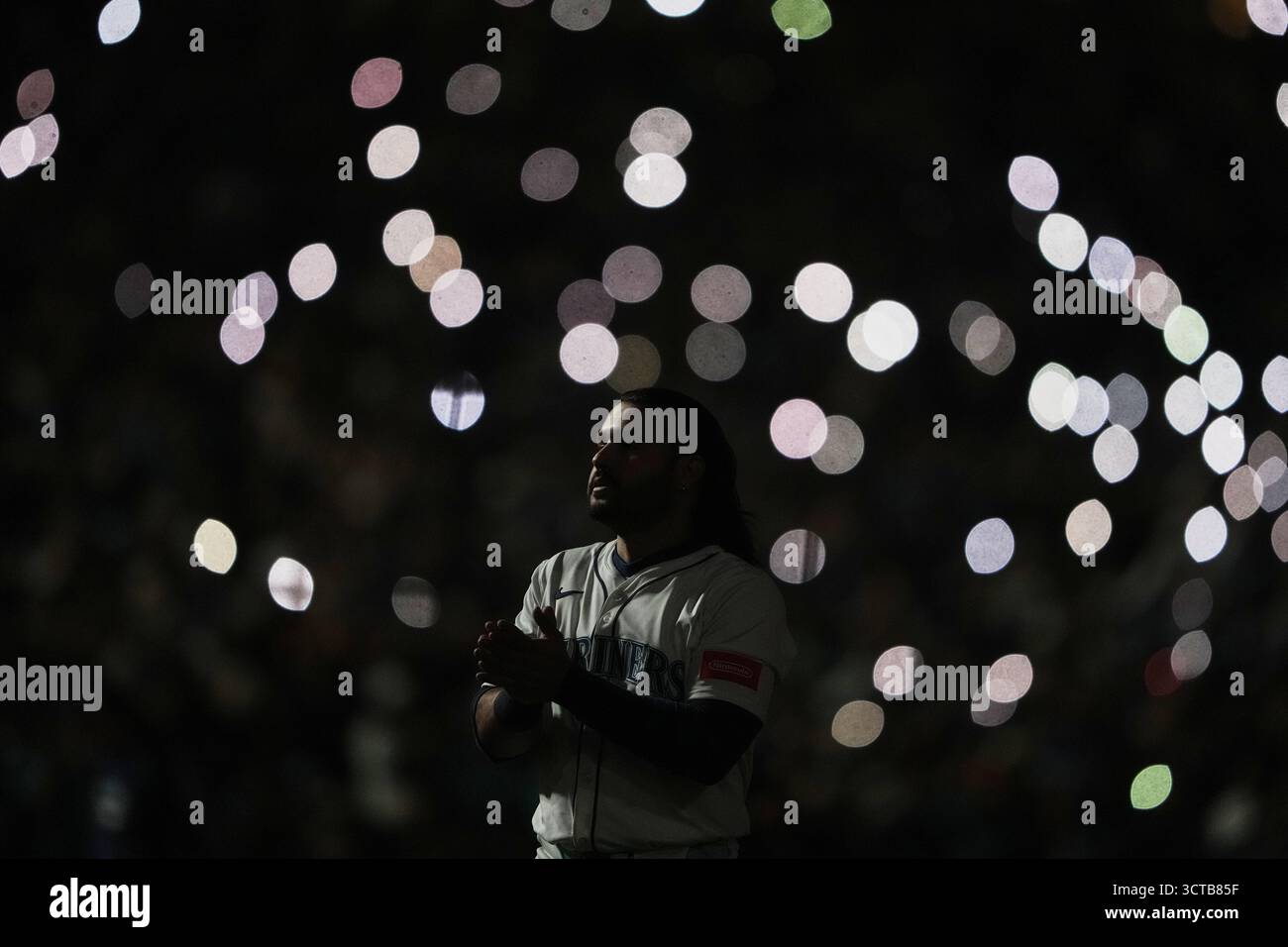 Seattle Mariners third baseman Eugenio Suarez walks on the field during ...
