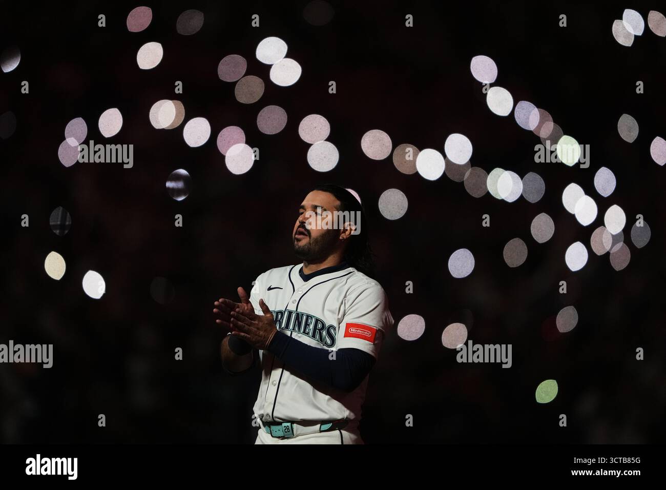 Seattle Mariners third baseman Eugenio Suarez walks on the field during ...