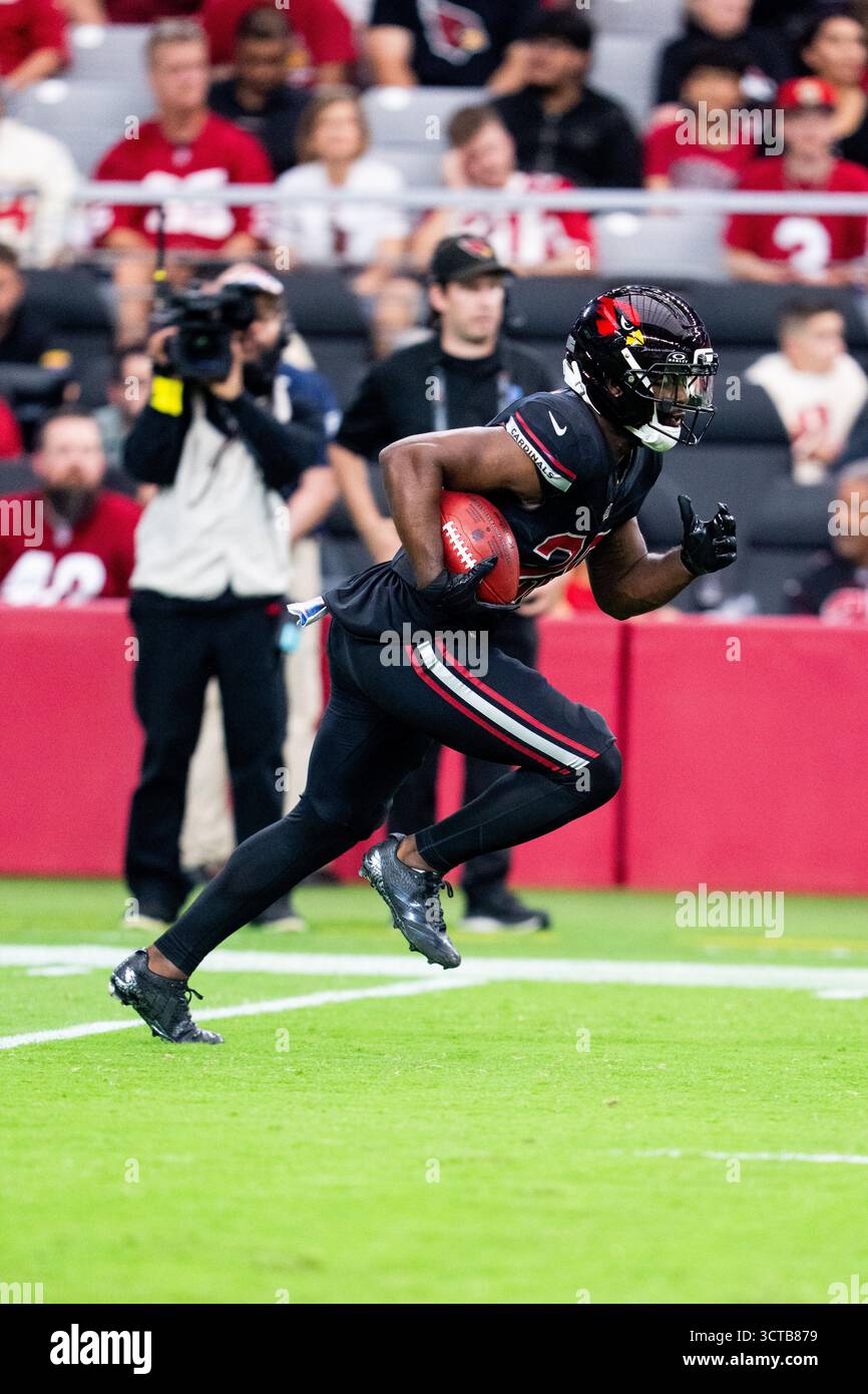 Arizona Cardinals running back Bam Knight (20) runs in an NFL football ...
