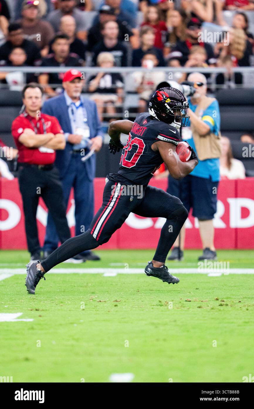 Arizona Cardinals running back Bam Knight (20) runs in an NFL football ...