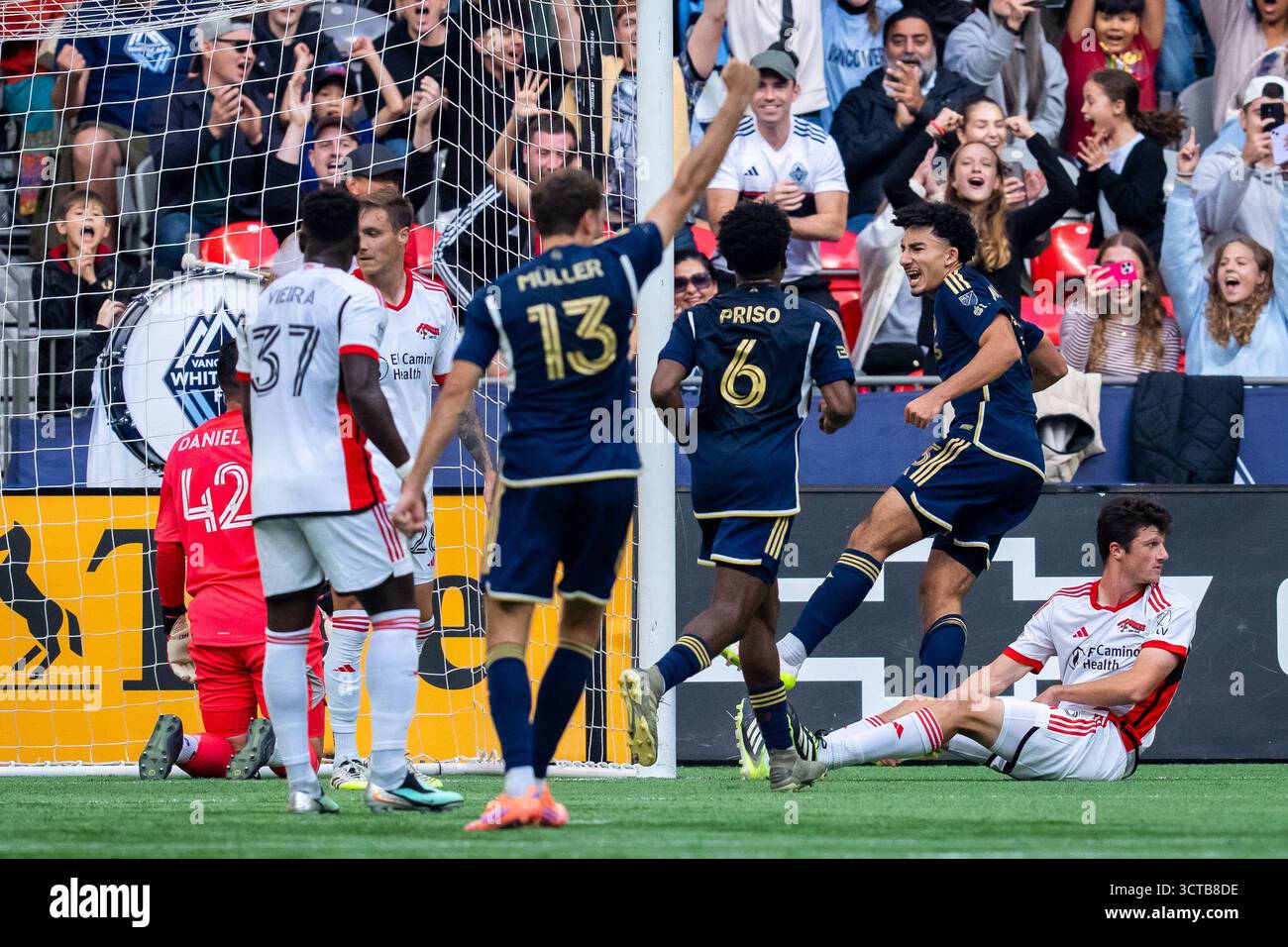 Vancouver Whitecaps' Rayan Elloumi, second right, celebrates his goal ...