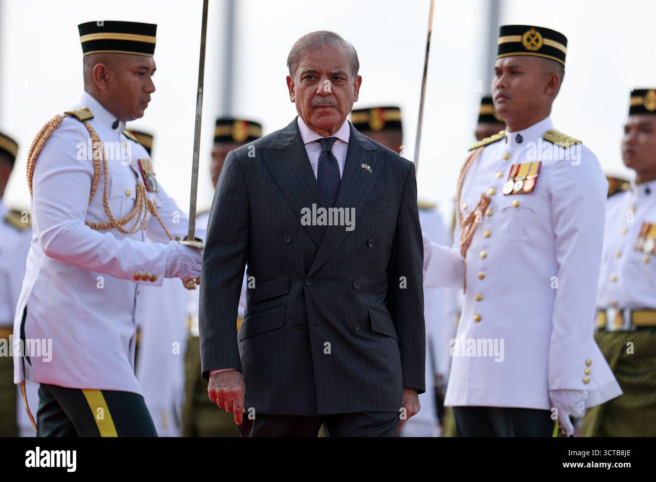Pakistan's Prime Minister Shehbaz Sharif inspects the honour guard ...