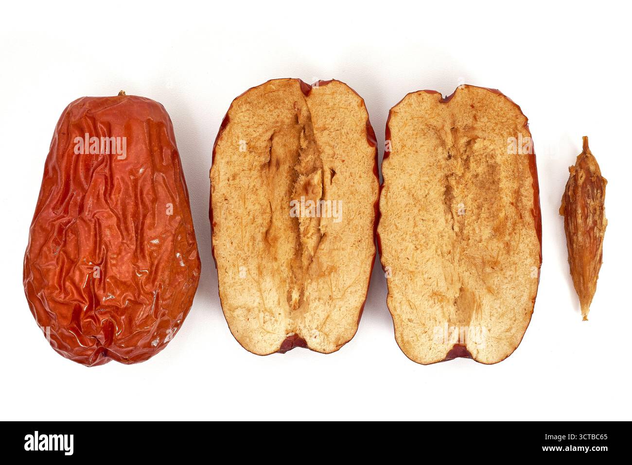 A complete deconstruction of a Chinese red date (jujube), isolated on a ...