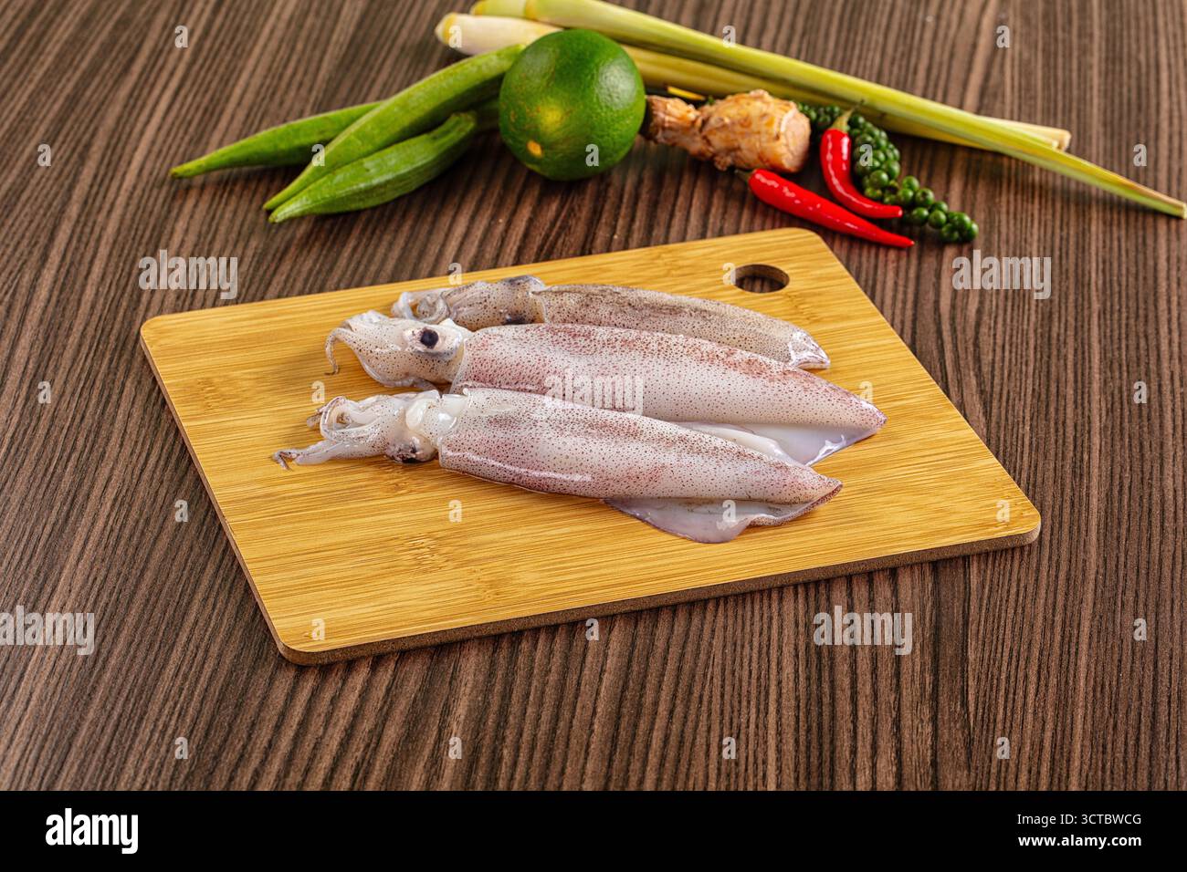 Raw wild fresh calamari for cooking Stock Photo - Alamy