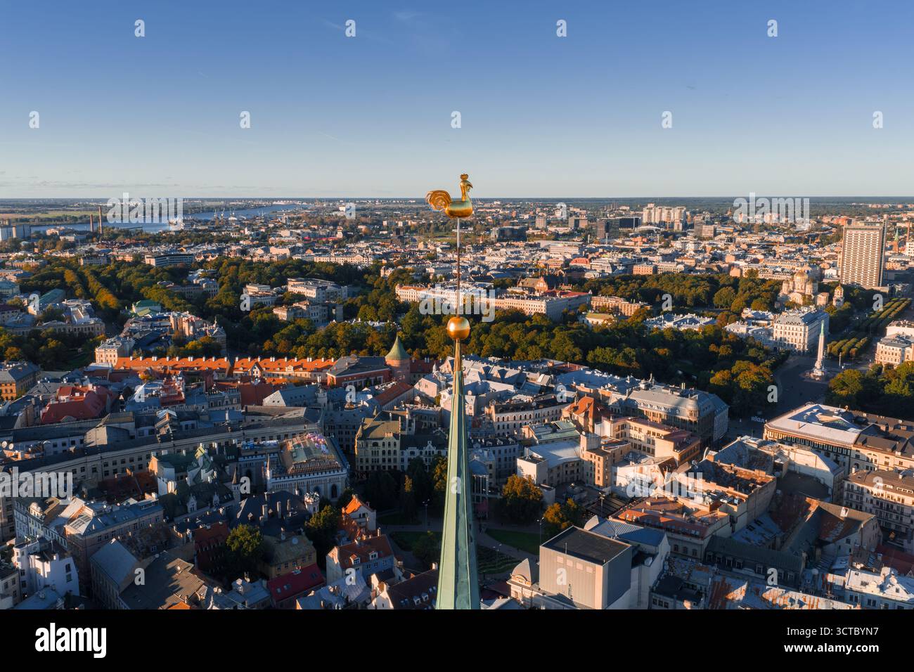 Aerial View of Riga with St. Peter's Church Spire and Daugava River ...