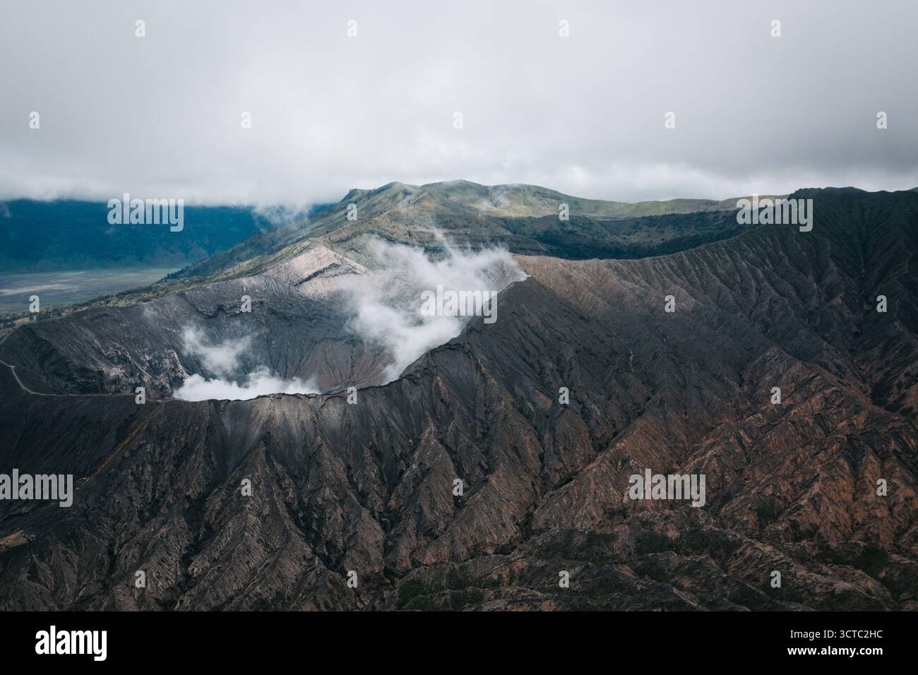 Aerial view of the rugged terrain of Mt. Bromo's volcanic caldera ...