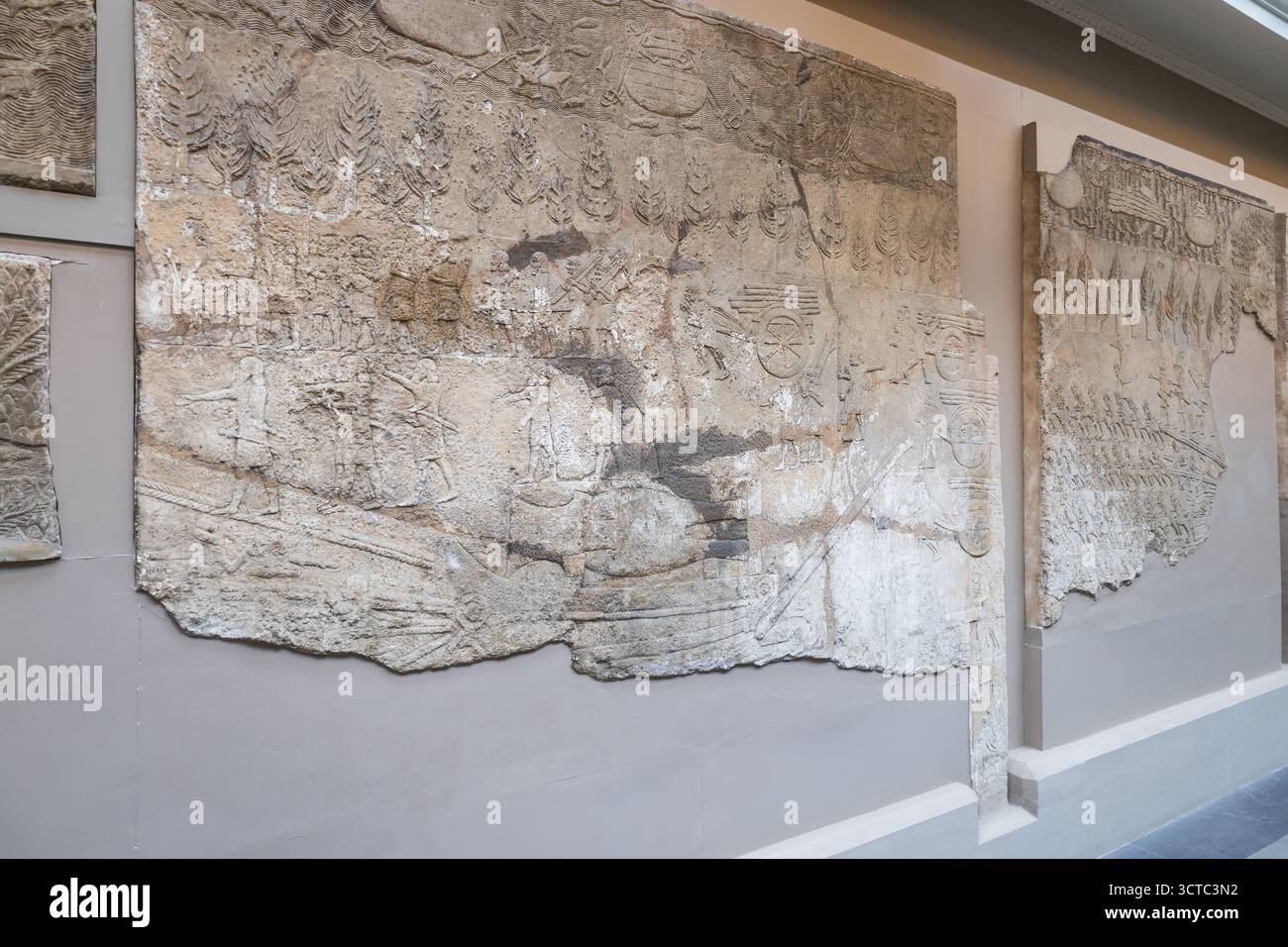 Ancient Assyrian stone relief panels on display at the British Museum ...
