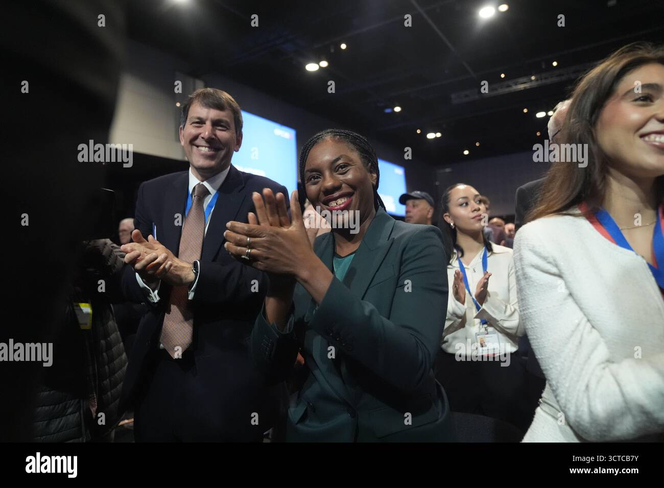 Party leader Kemi Bandenoch applauds after shadow chancellor Sir Mel ...