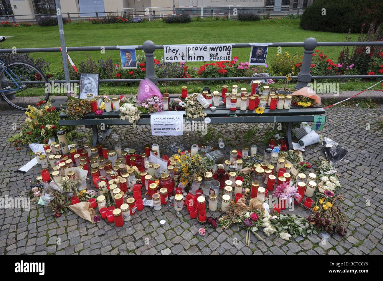 Germany, Berlin, 21.09.2025, bench with flowers, mourning candles, for ...