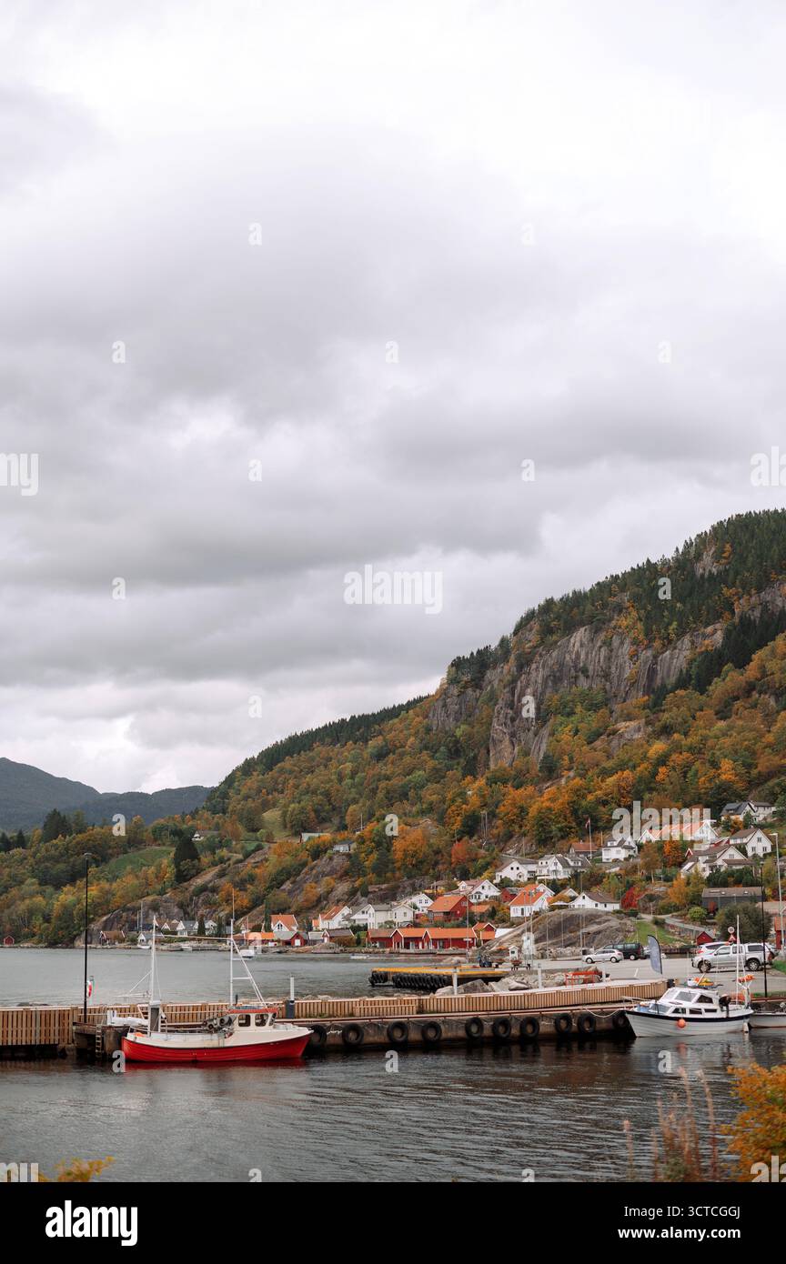 Coastal Village with Boats and Autumn Foliage Stock Photo - Alamy