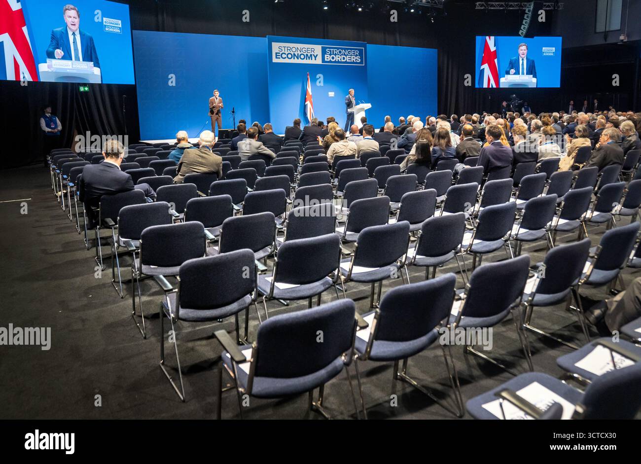 Empty seats in the auditorium as shadow chancellor Sir Mel Stride makes ...