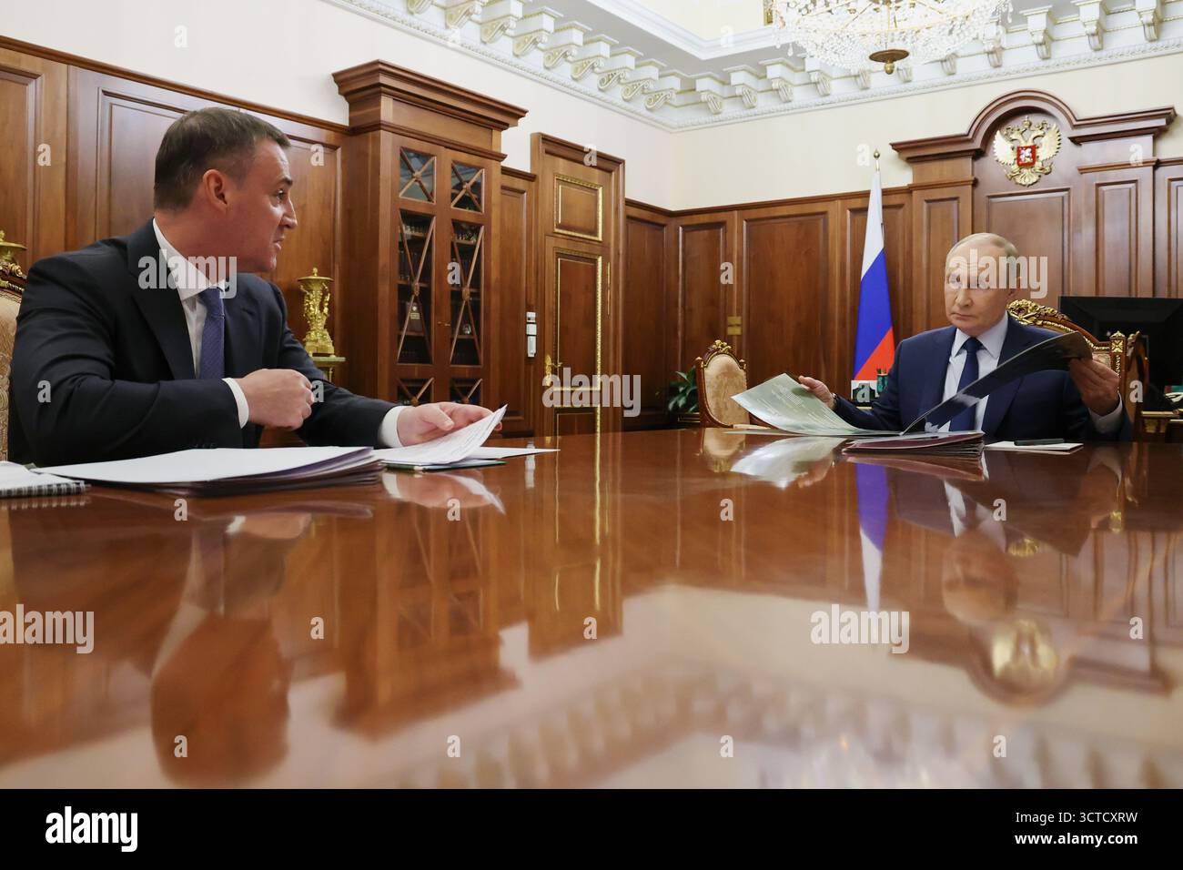 Russian President Vladimir Putin, right, speaks with Russian Deputy ...
