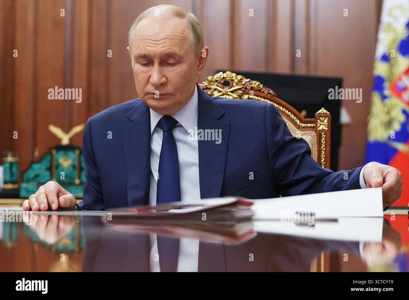 Russian President Vladimir Putin attends a meeting with Russian Deputy Prime Minister Dmitri ...