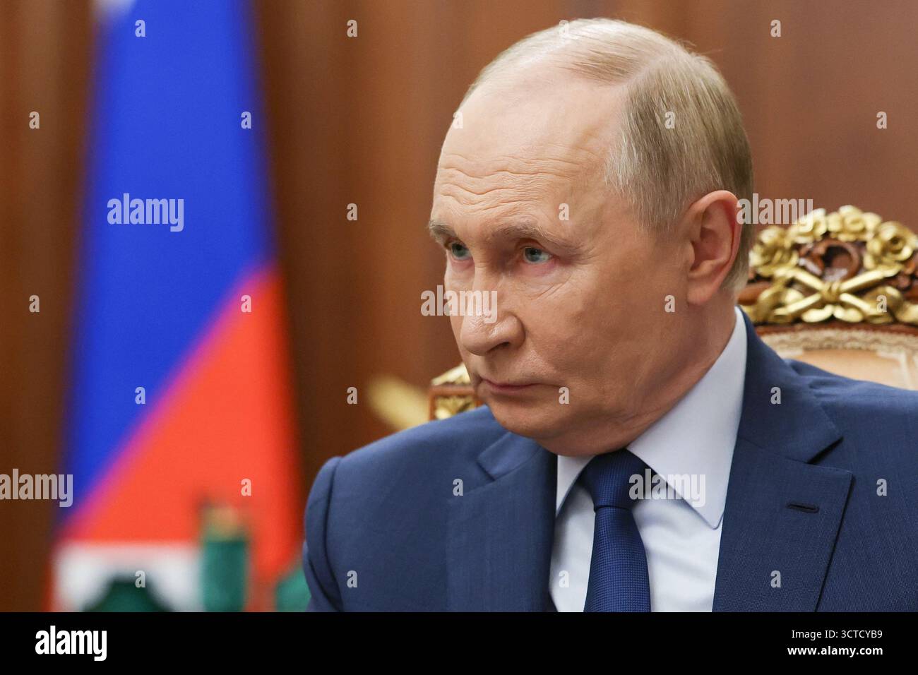 Russian President Vladimir Putin attends a meeting with Russian Deputy Prime Minister Dmitri ...