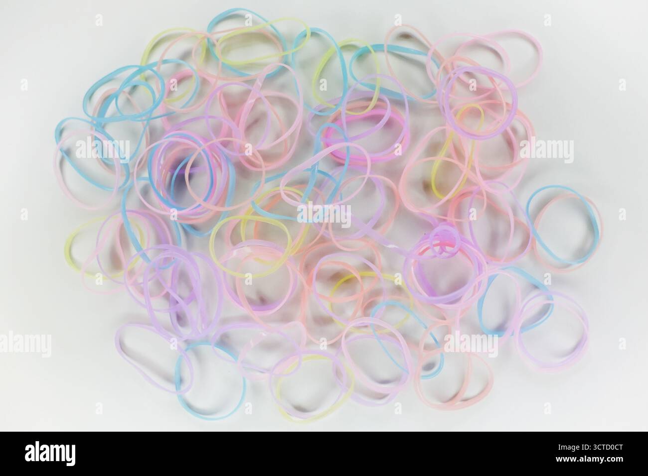 Pile of pastel color rubber bands isolated on white background Stock ...