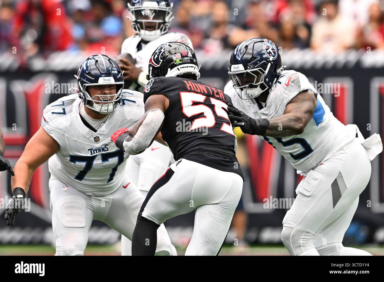 Tennessee Titans offensive tackle Peter Skoronski (77) and offensive ...