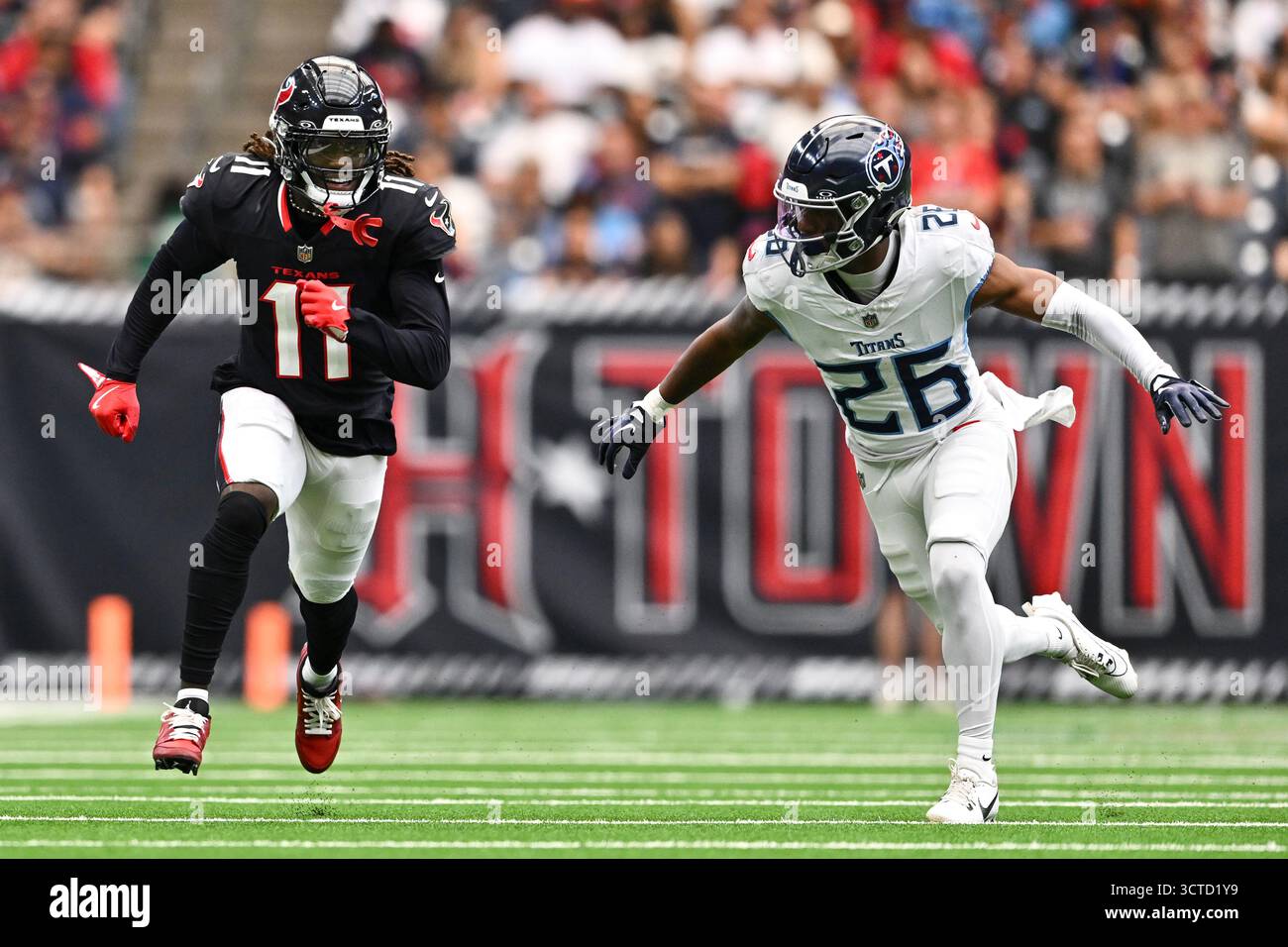 Houston Texans cornerback Tremon Smith (11) and Tennessee Titans ...