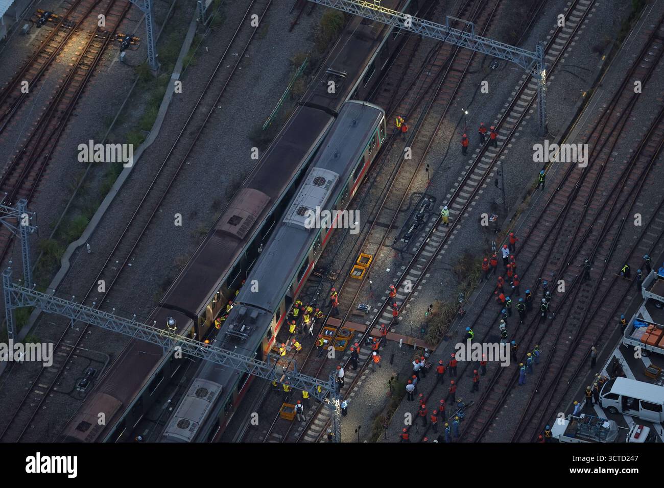An aerial photograph shows the two trains that collided on the Tokyu ...