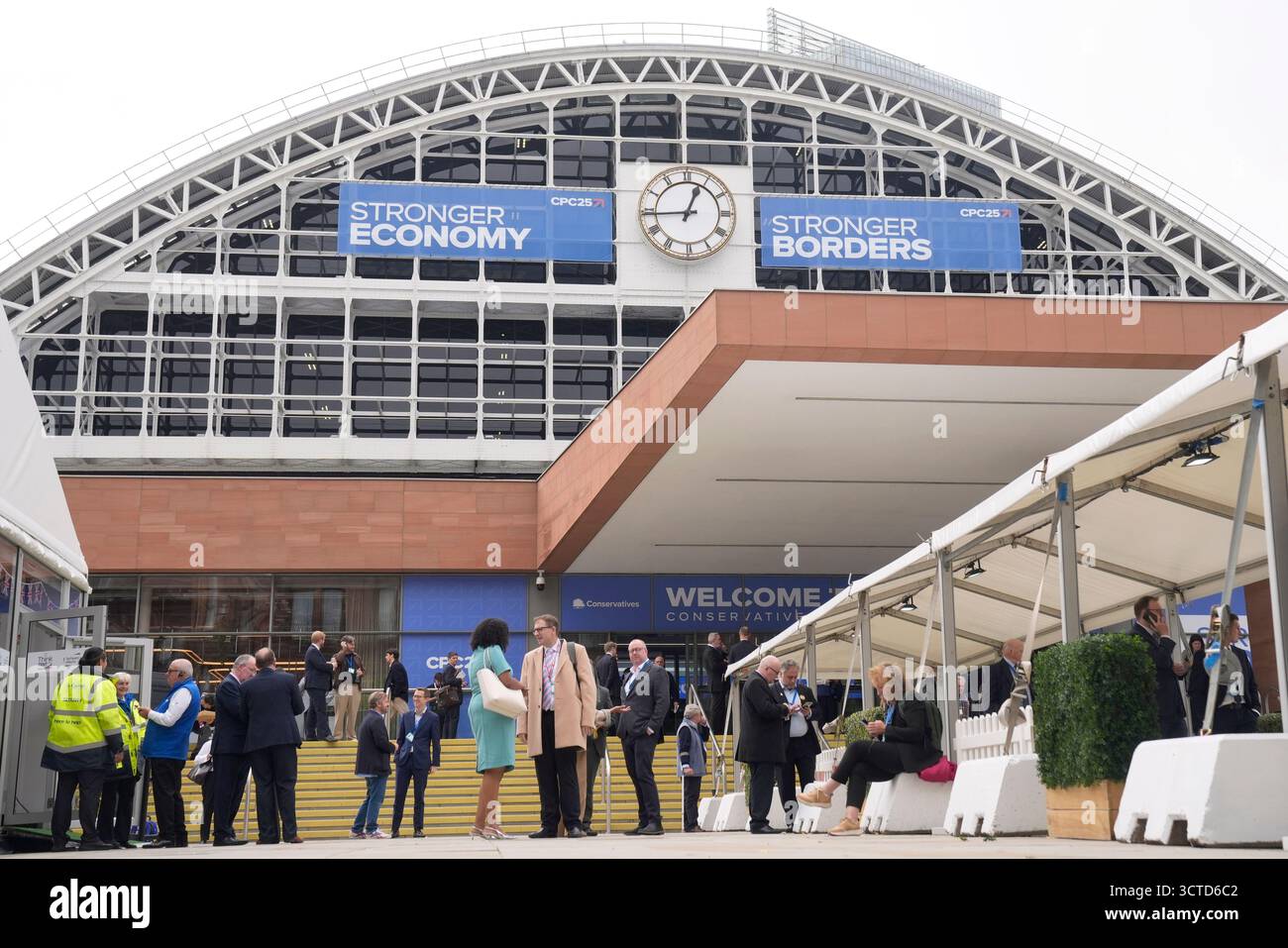 Members of the public gather outside the Conservative Party Conference ...