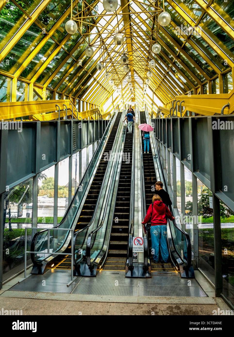 Modern glass escalator leading hi-res stock photography and images - Alamy