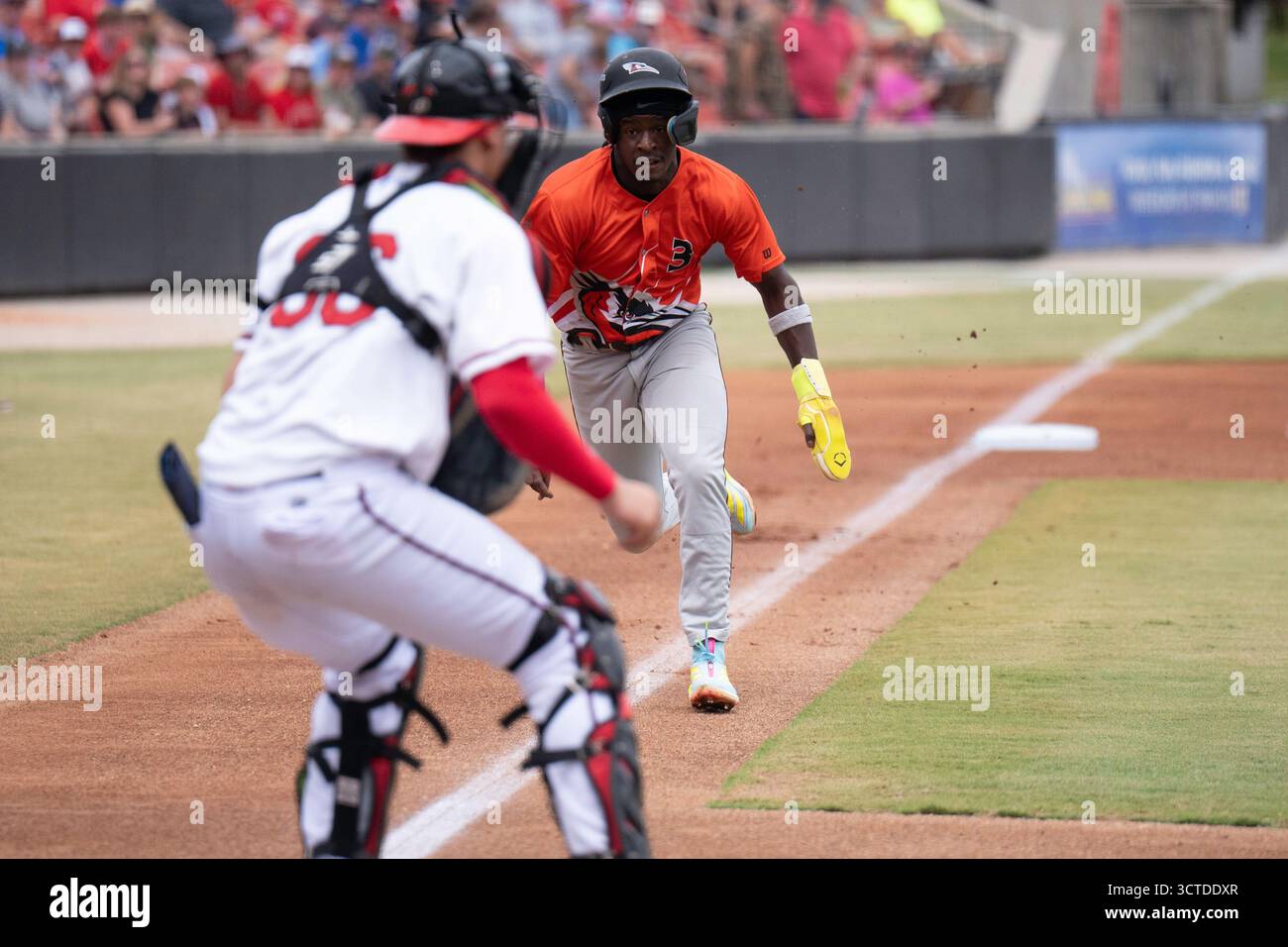 RJ Austin (3) of the Delmarva Shorebirds runs towards home plate during ...