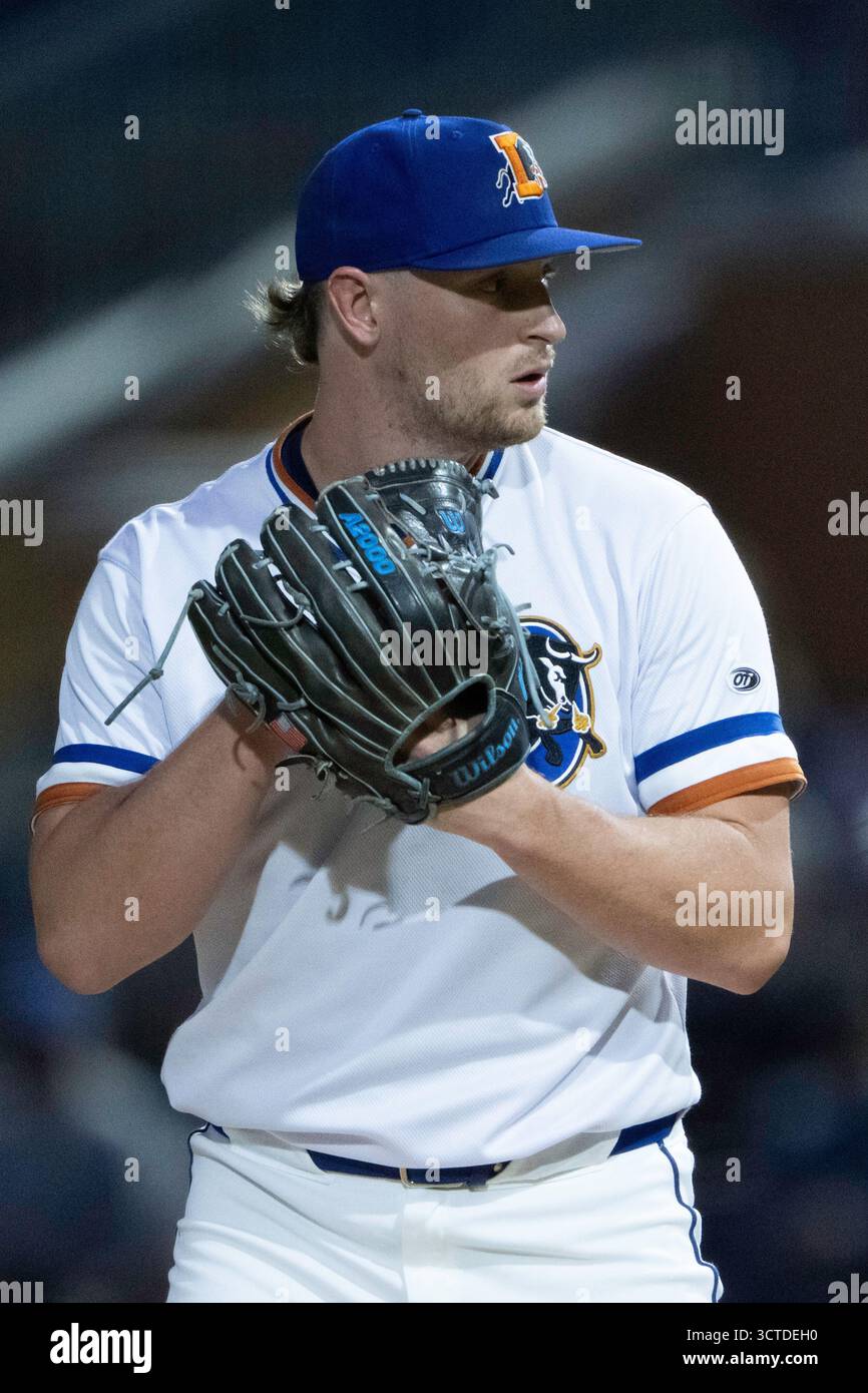 Pitcher Cole Wilcox (15) of the Durham Bulls looks to his catcher for ...