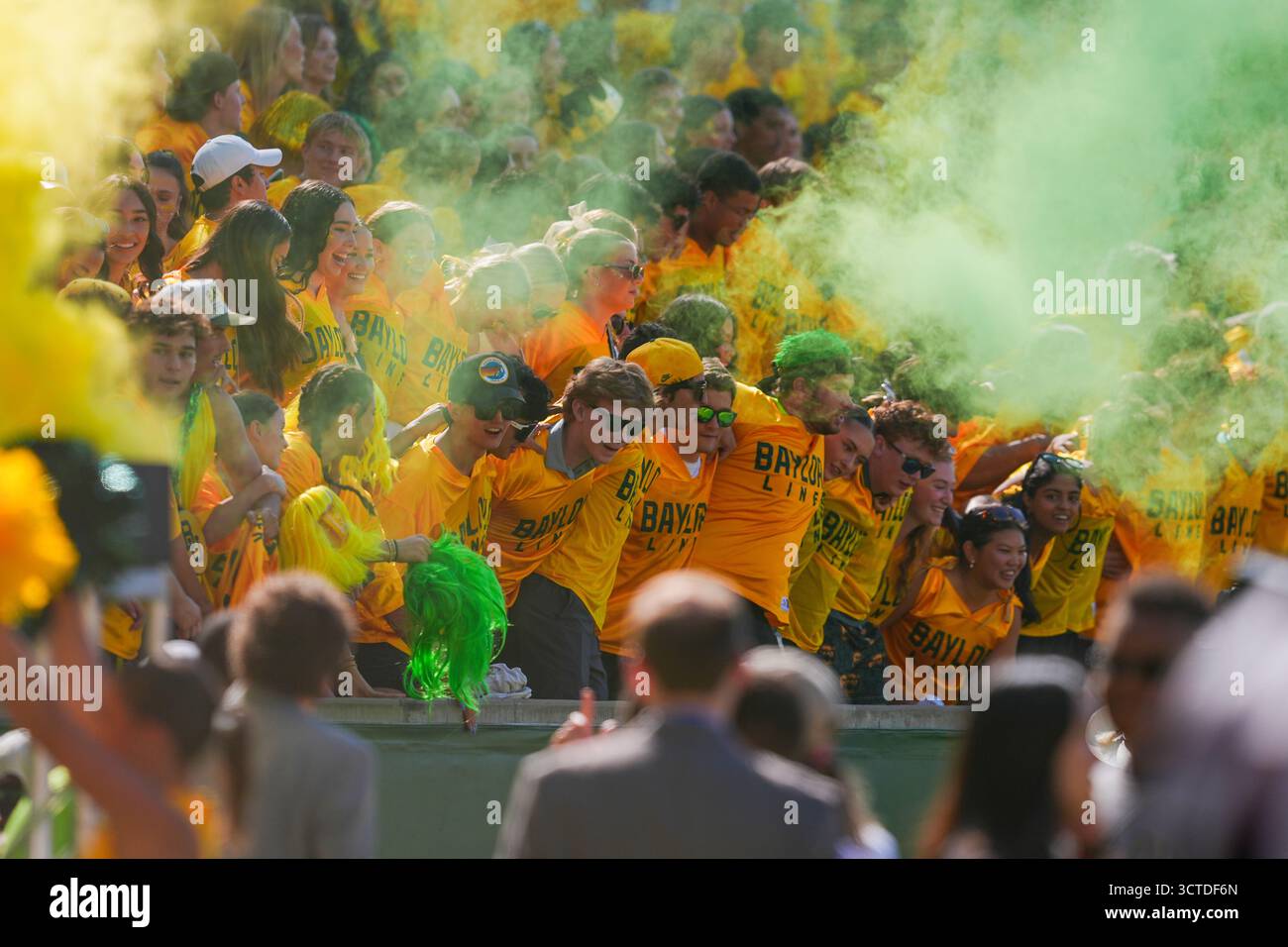 Baylor fans react in the stand before kick off during an NCAA college ...