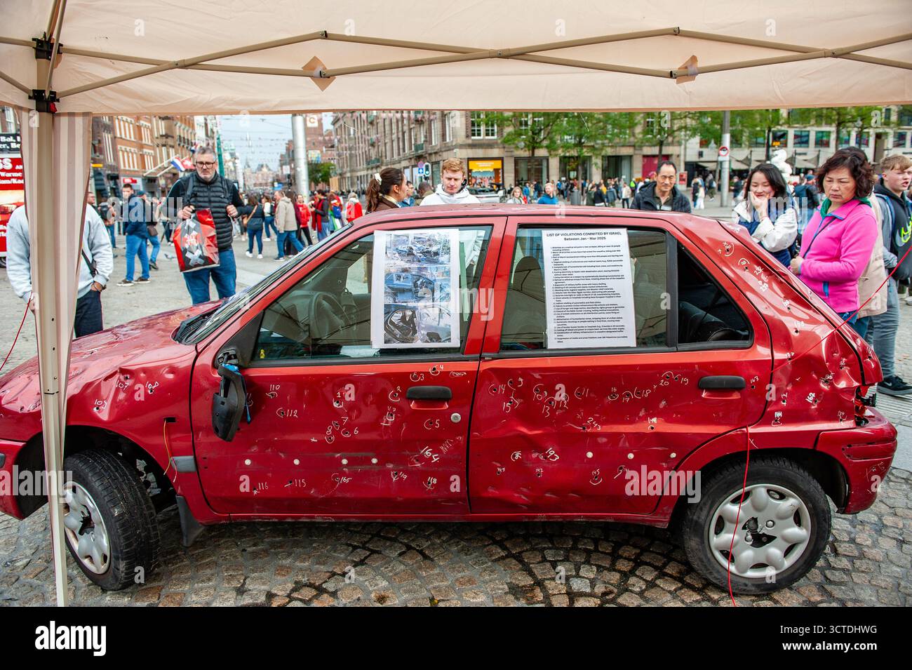 General view of a car full of bullets. A vehicle representing five-year ...