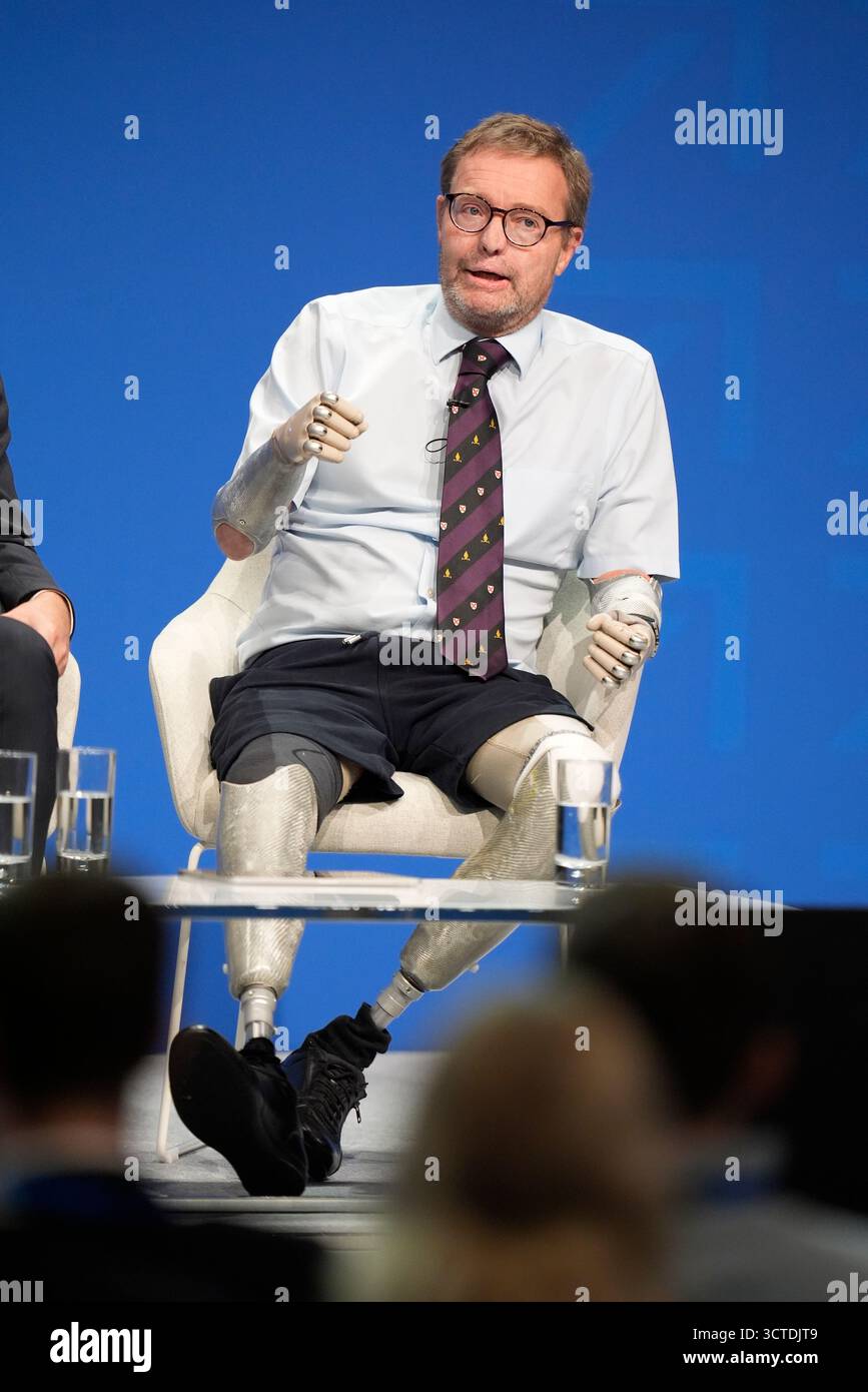 Lord Craig Mackinlay on stage during the Conservative Party Conference ...