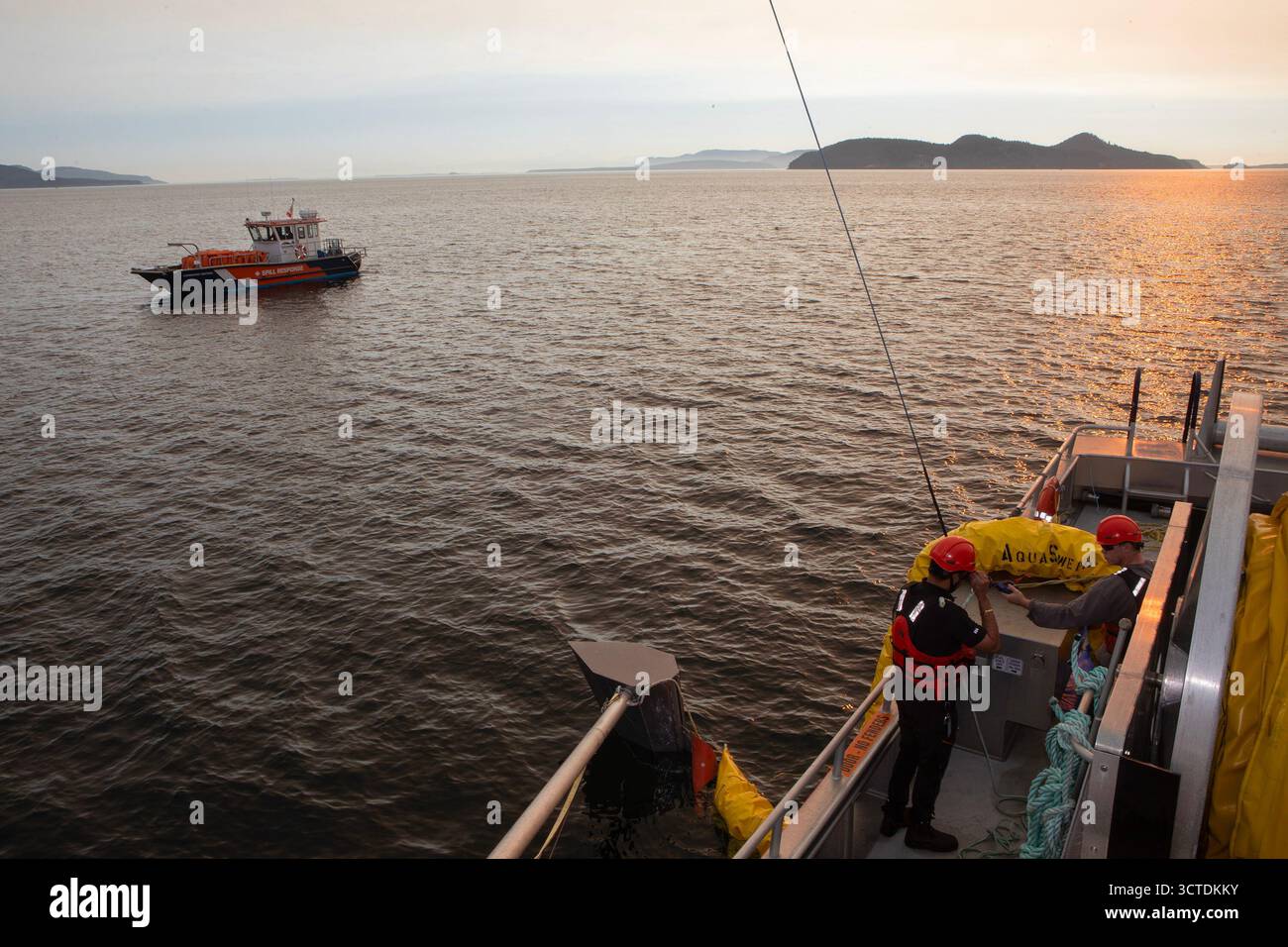 Western Canada Marine Response Corporation crew members aboard the ...