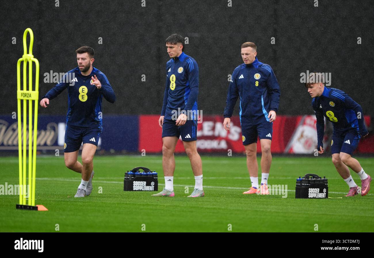 (left to right) Scotland's Grant Hanley, Kieron Bowie, Lewis Ferguson ...