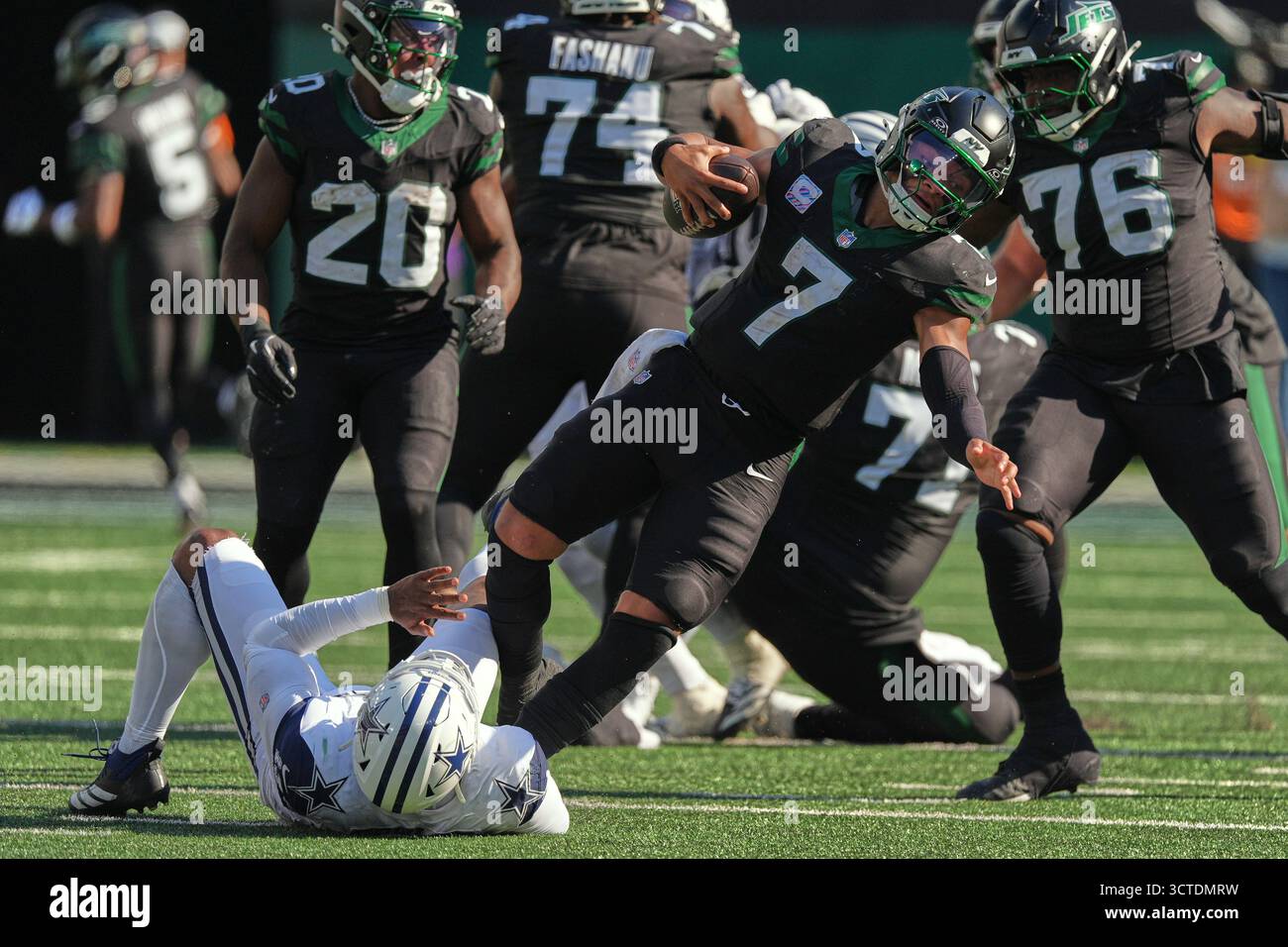 Dallas Cowboys' Dante Fowler Jr., bottom left, sacks New York Jets ...