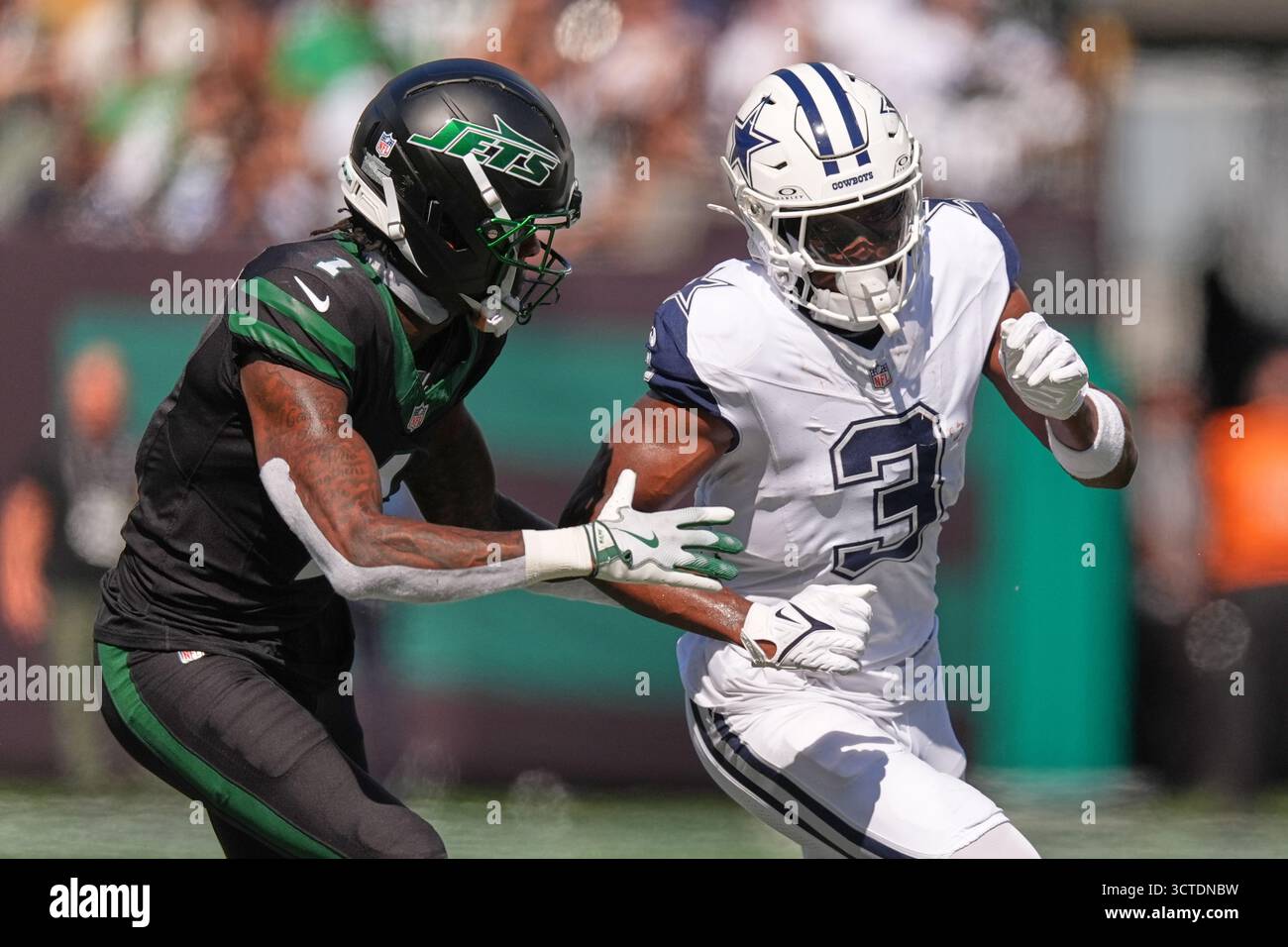 Dallas Cowboys' George Pickens, right, matches up against New York Jets ...