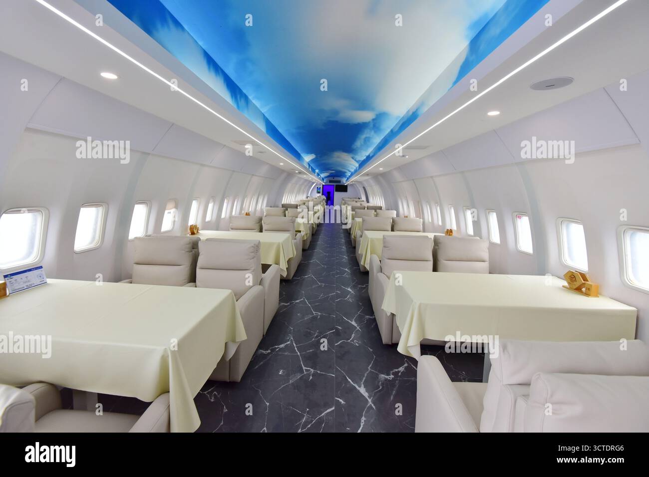 The interior of the aircraft - turned - restaurant features neatly ...
