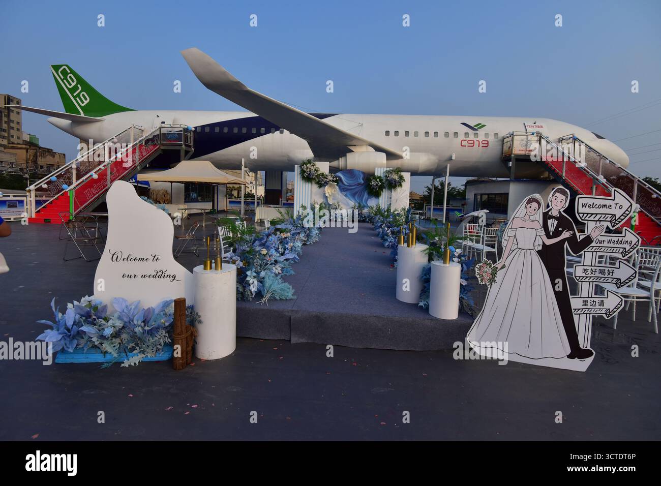 The aircraft - themed venue is decorated for a wedding, with the plane ...